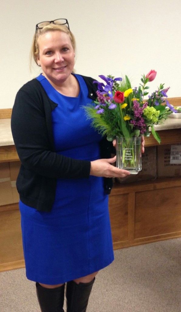 Sharon with flowers | ALABAMA BROADCASTERS ASSOCIATION